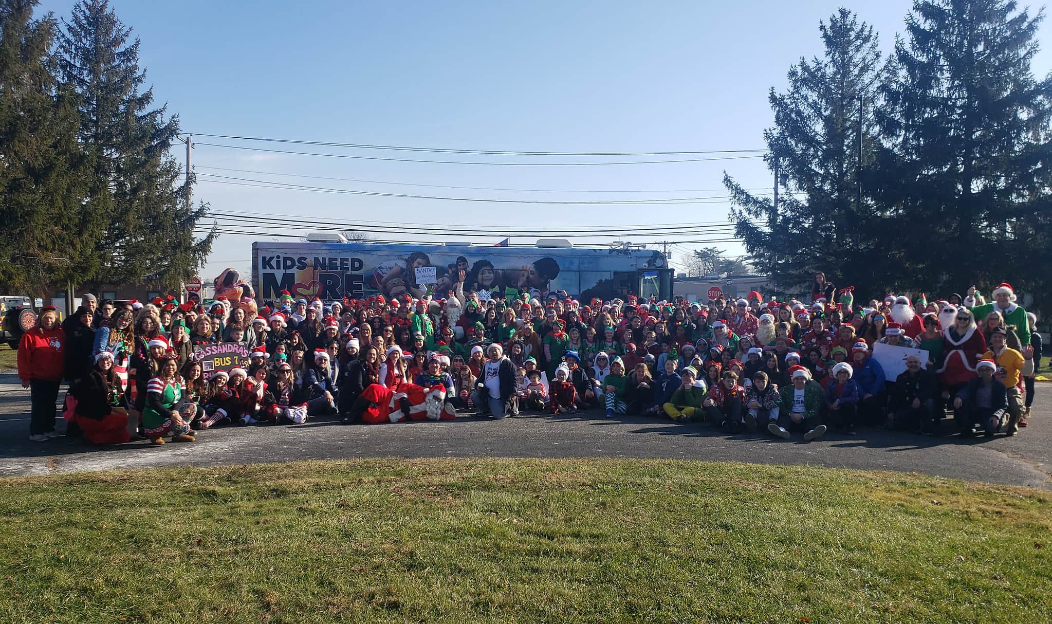 Kids Need More Holiday Cheer Bus Elf Ride Delivers Toys to Sick Children