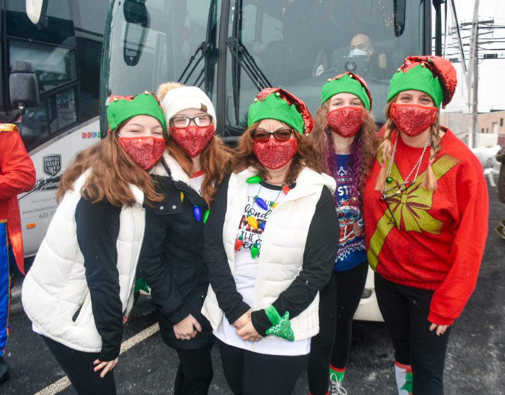 Kids Need More Hosts 6th Annual Holiday Cheer Bus Elf Ride