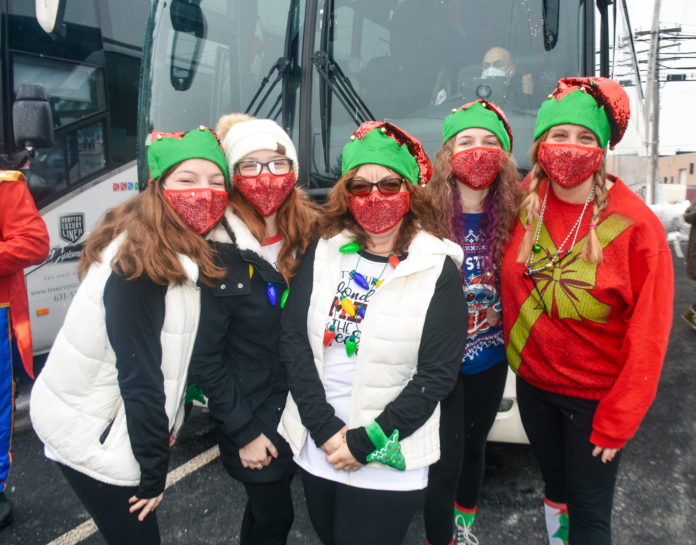 Kids Need More Hosts 6th Annual Holiday Cheer Bus Elf Ride
