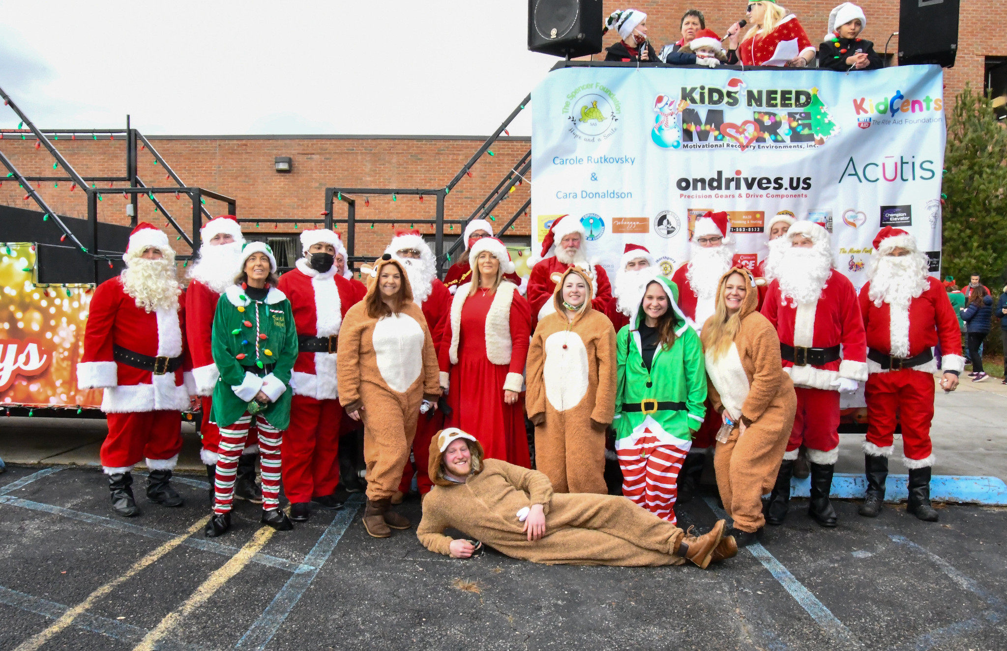 Kids Need More Holds 7th Annual Holiday Cheer Bus Elf Ride