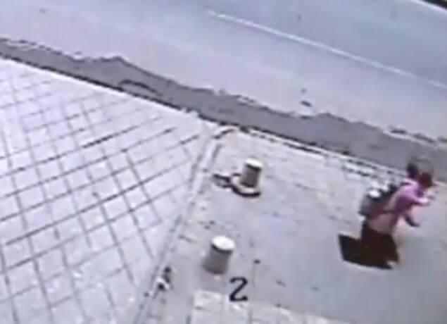 Girl Falls Through Pavement, Survives (Video)