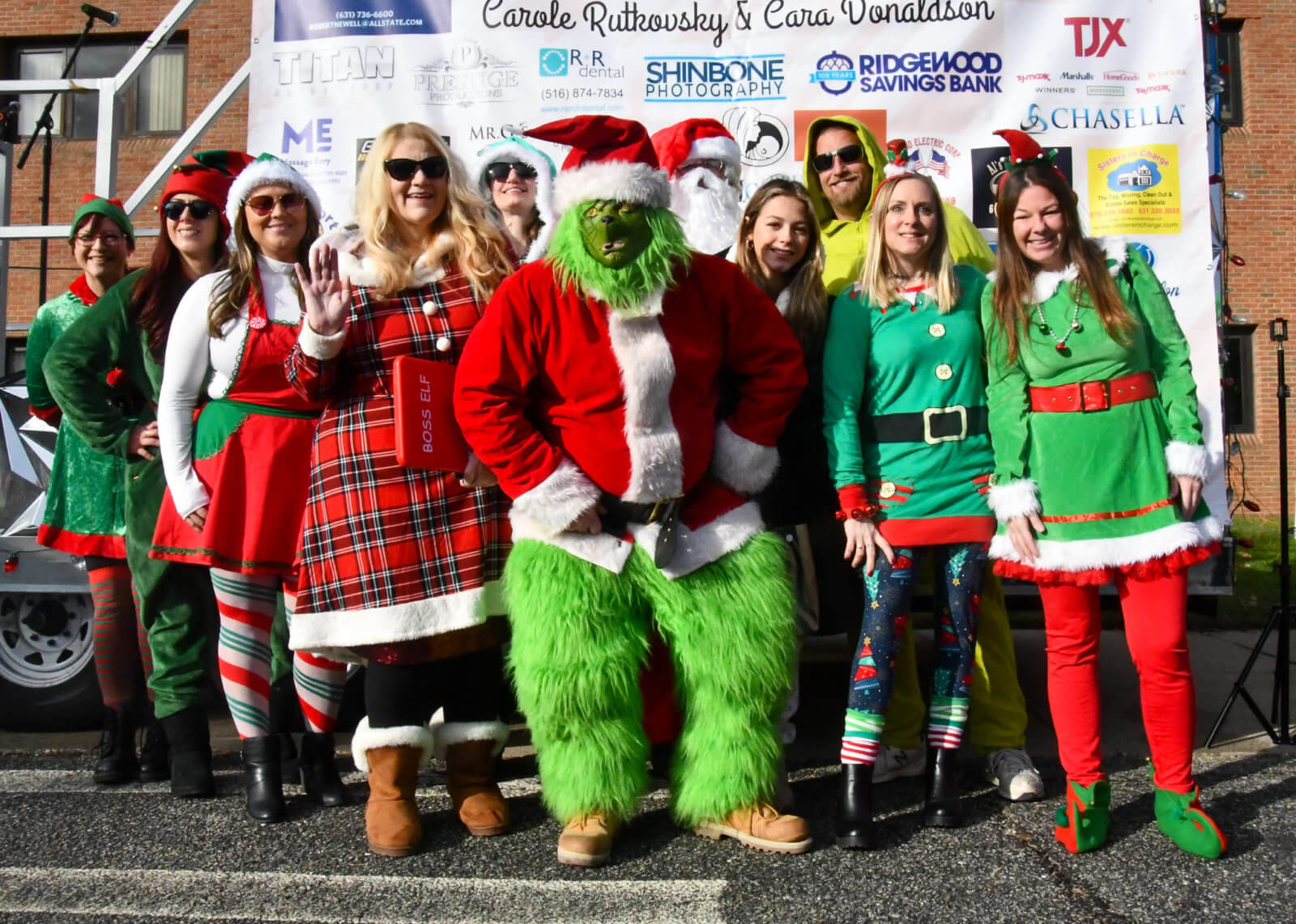 The 8th Annual Kids Need More Holiday Cheer Bus Elf Ride