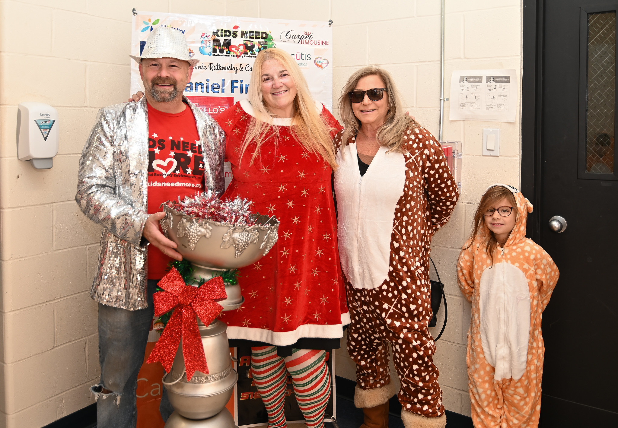 Kids Need More to host 10th annual Holiday Cheer Bus Elf Ride