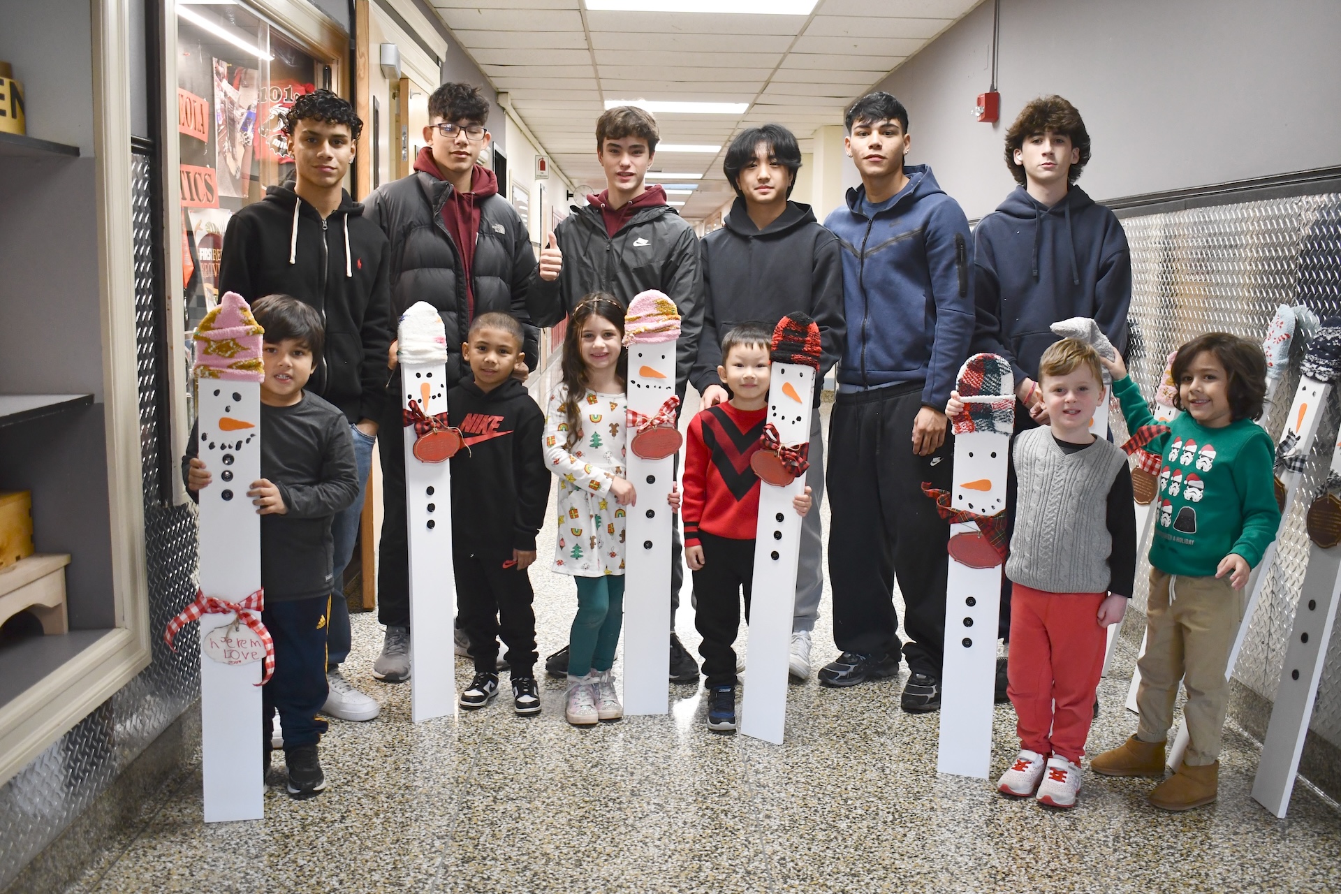 Mineola learners collaborate for holiday snowman project